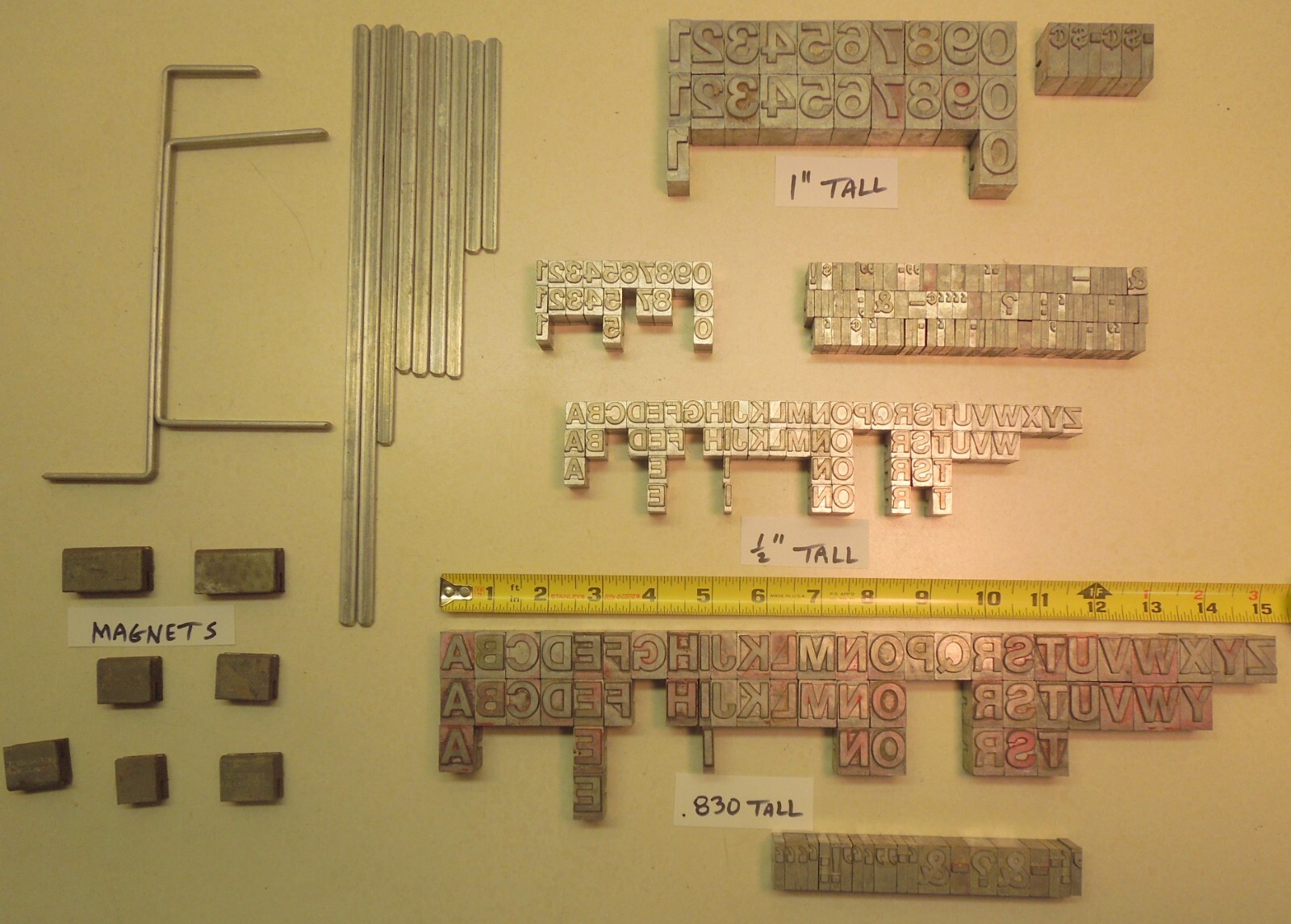 PRINTING PRESS, "METAL" TYPESET, NUMBERS, LETTERS, SYMBOLS AND SPACERS ...