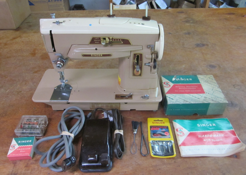 older Singer Slant-O-Matic Special 403 w/ attachments and owner's ...