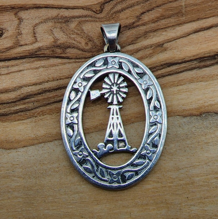 James Avery Retired Windmill Pendant Sterling. 925 - Gem