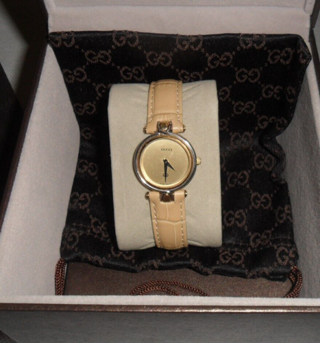 Gucci Ladies 4500L Watch Gold bezel and chrome intertwined on Face ...