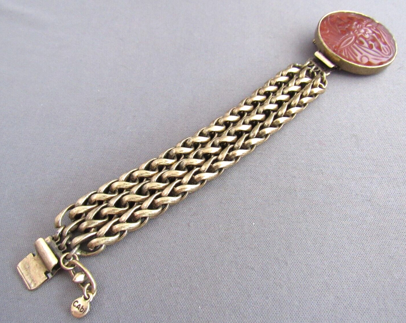 CABI GOLD TONE TRIPLE BRAIDED LUCITE CARVED TENNIS BR… - Gem