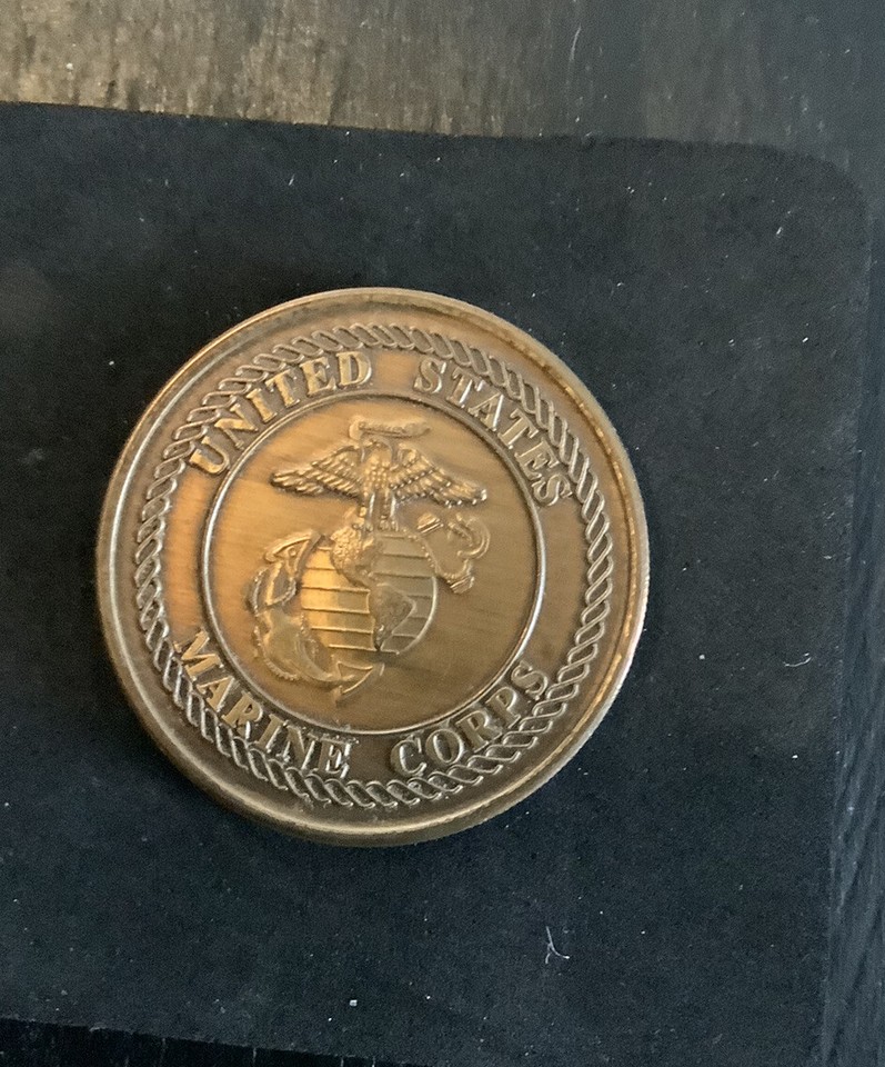 A United States Marine Corps Coin with the Marine Promise On The ...