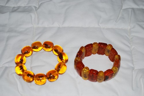 Amber Faux Bracelets, Plastic ?, stretch band featuring insects inside ...