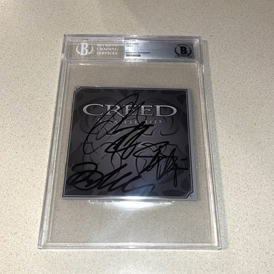 CREED BAND GROUP signed autographed GREATEST HITS CD BOOK BECKETT BAS ...