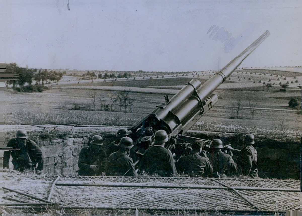 Line Of Artillery Guns Firing