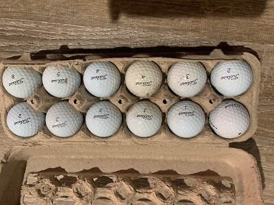 Used pro v1 golf balls they are all white and cleaned and in a box or a ...