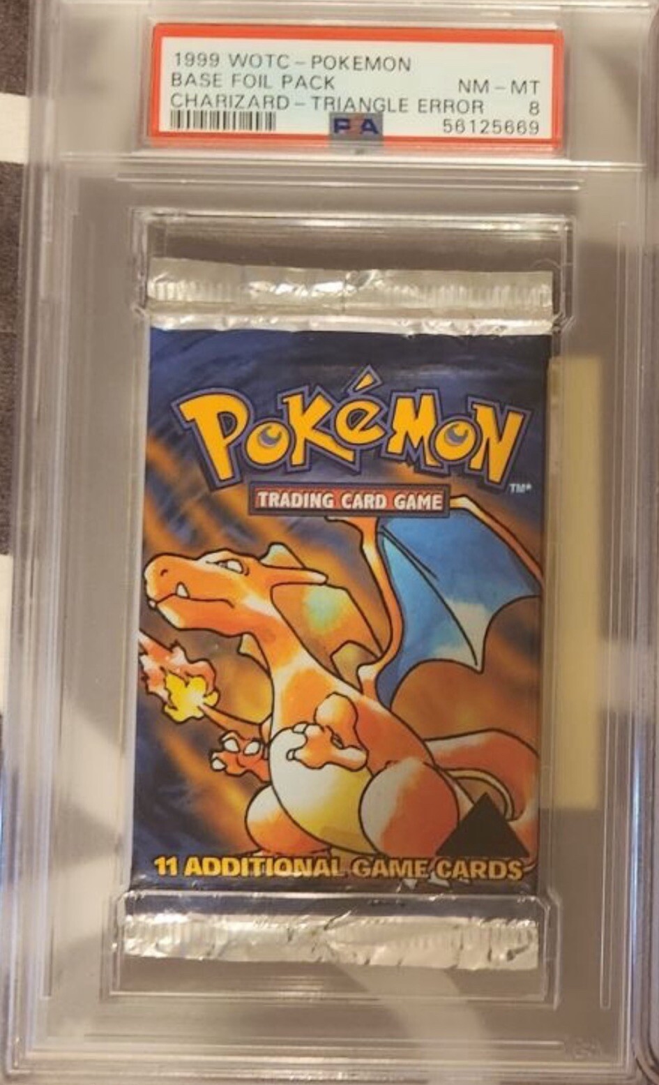 1999 Pokémon Charizard Art Base Set Triangle Error Stamped Booster Pack ...