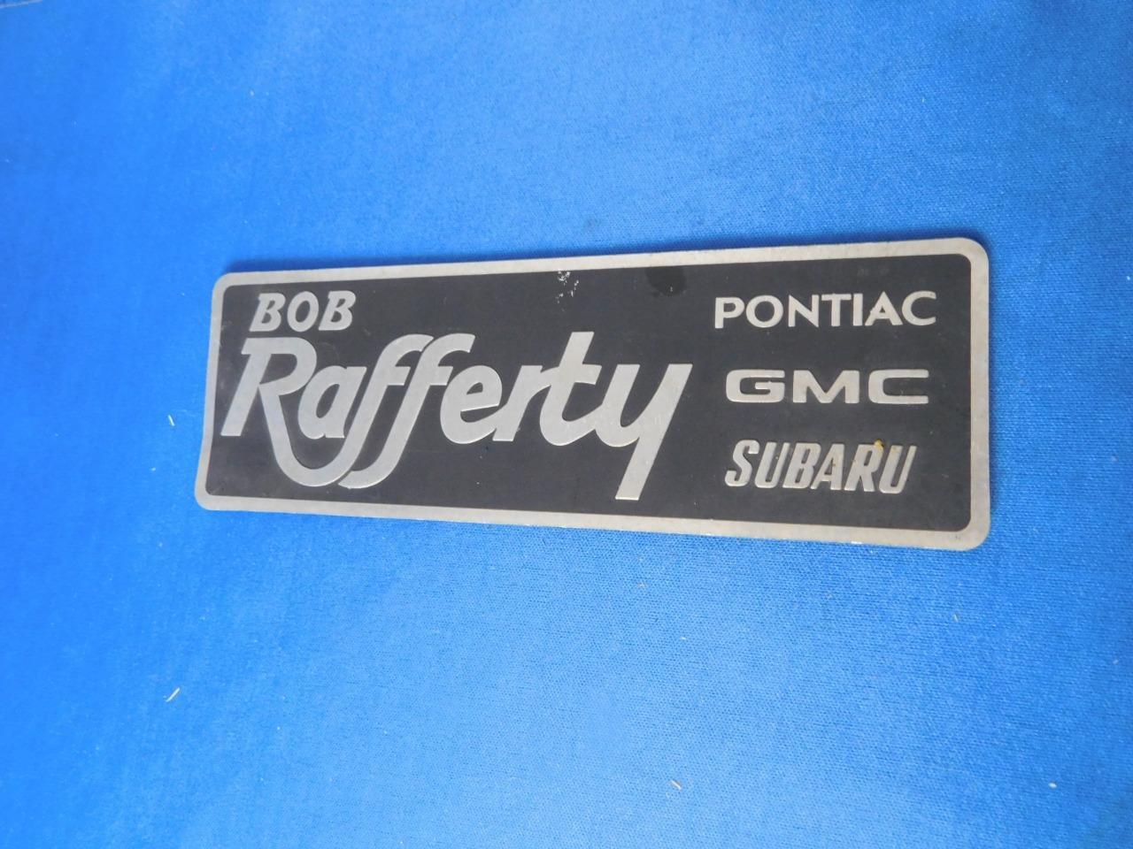 BOB RAFFERTY PONTIAC GMC SUBARU DEALERSHIP CAR TRUCK EMBLEM ADVERTISING ...