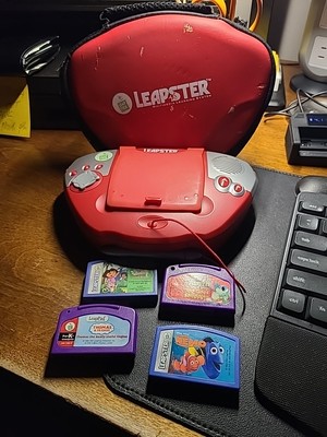 LeapFrog Leapster silver handheld with 14games and carrying case ...