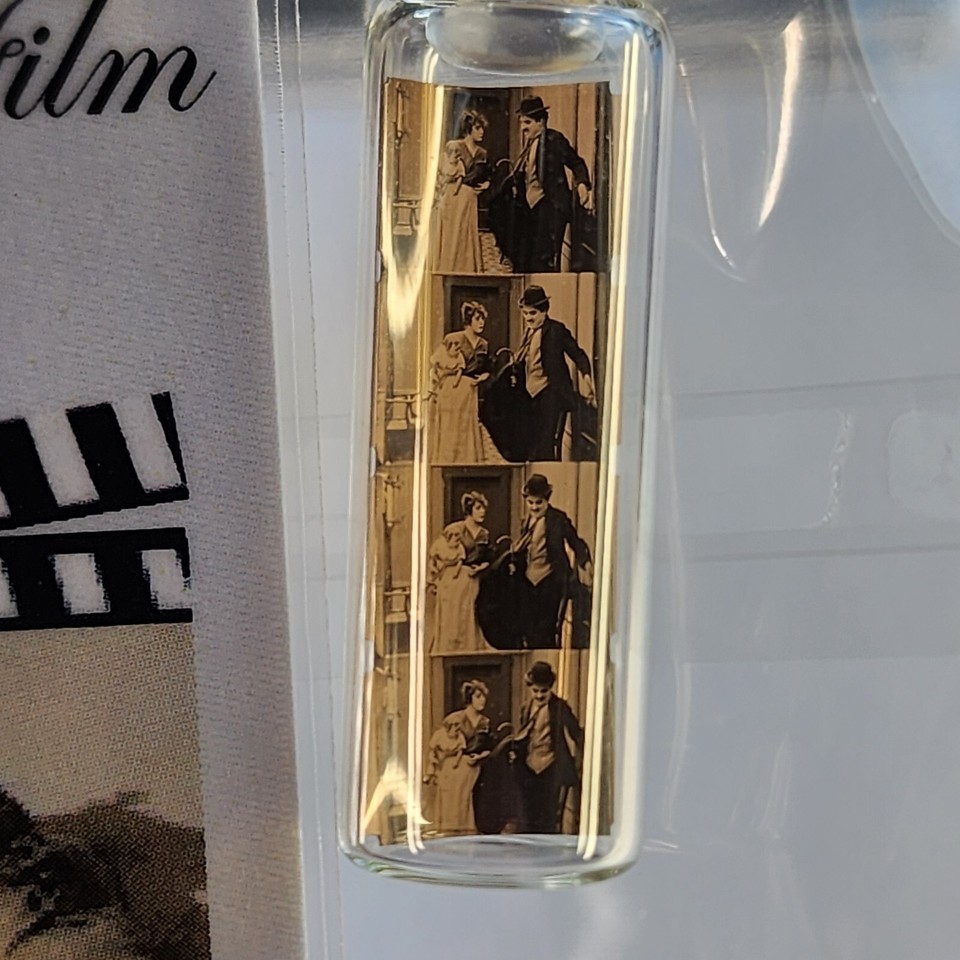 charlie chaplin vintage film cells. strip inside vial, magnet ,photo ...
