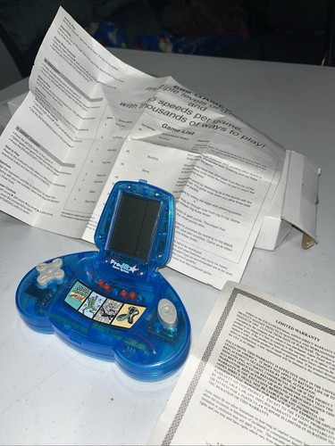 Vintage Pro Jr Handheld Game System clear blue | eBay