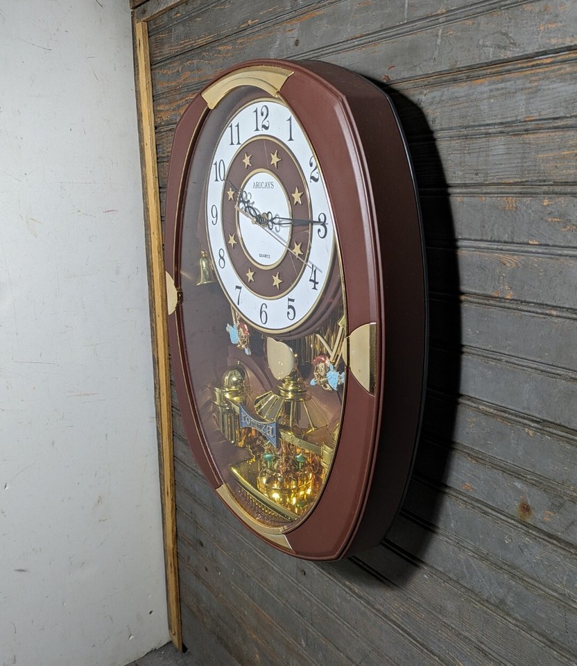 Read: RARE Vintage Aricays Romanza Musical Quartz Wall Clock Angels ...