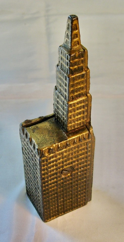 ANTIQUE CAST IRON COIN BANK WOOLWORTH BUILDING FIGURE 1915 | eBay