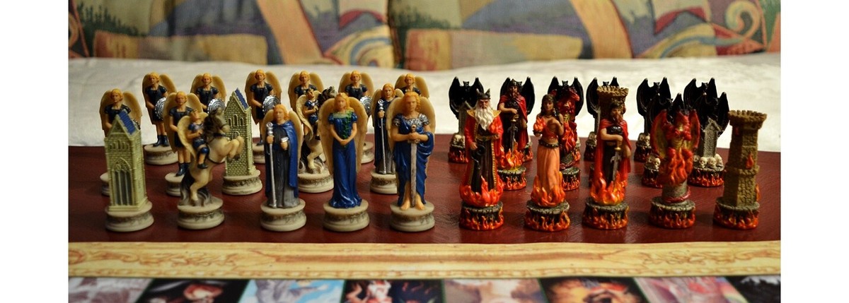 Demon Vs Angel Playing Chess