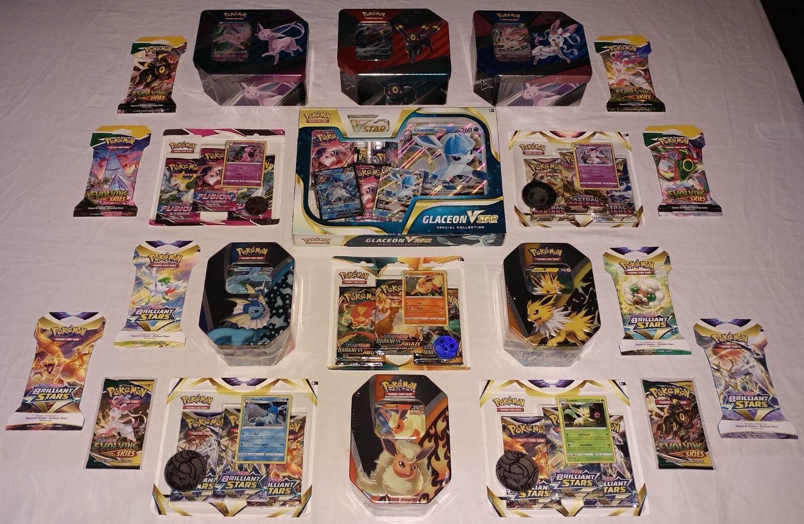 57 Pokemon Packs 🤗Tins - 3 Pack Blister Packs - 14 Evolving Skies Packs ...