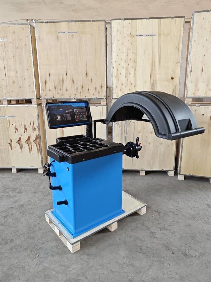 COMPUTERISED WHEEL BALANCER MACHINE MOTOR OPERATED UP TO 24 INCH RIM ...