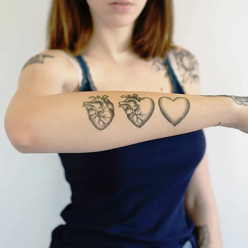 Evolution Symbols Tattoos