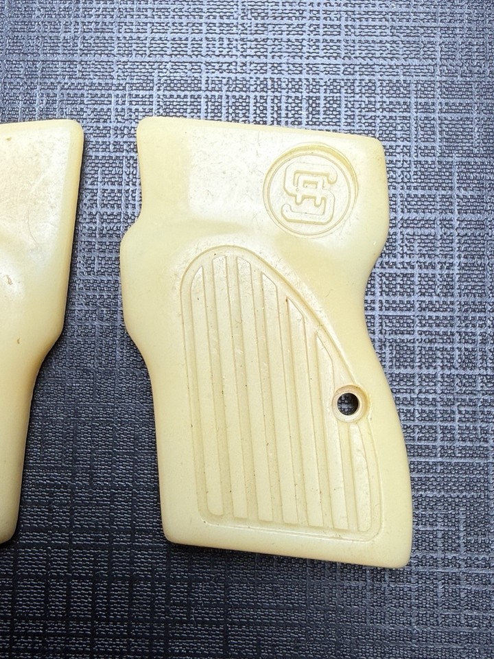 Sterling Arms Model 300 302 .25 Auto ACP Faux Ivory Factory Grips | eBay