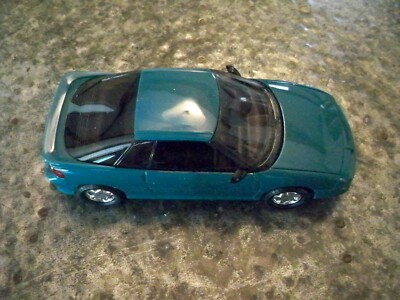 AMT Ertl 1991 Chevrolet Geo Storm GSI #6963 Teal Blue Metallic Promo w ...