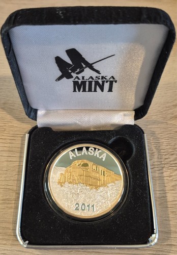 2011 Alaska Mint 1 Oz Silver coin .999 Fine /24 KT Gold Relief Commem ...