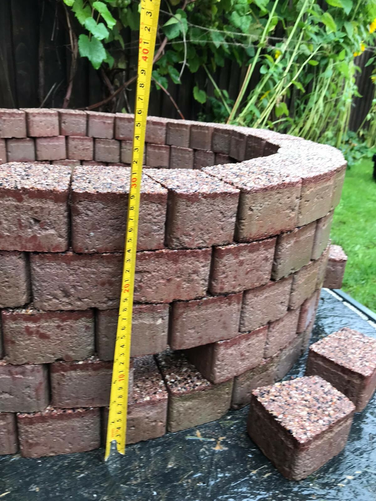 rounded fire pit kit brick Fireplace concrete stones log burner wood ...