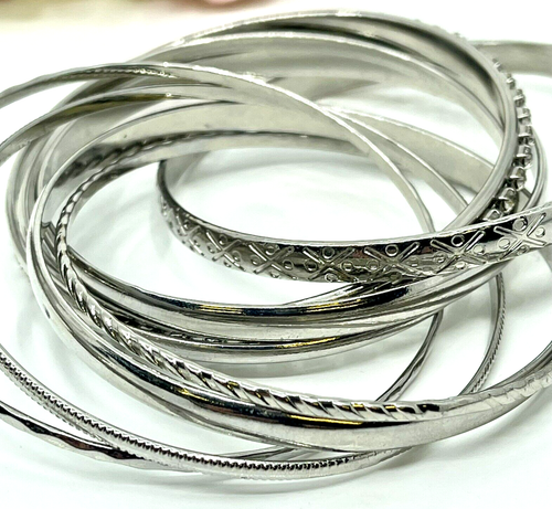 Bangle Bracelets Silver Tone Stack of 8 Connected Nice Bangle Bracelets ...