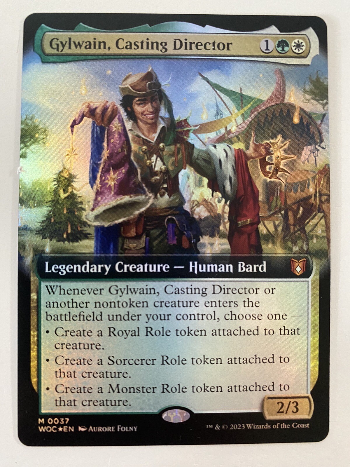 Gylwain, Casting Director *FOIL* EXT ART Wilds Of Eldraine MTG NM/MT ...