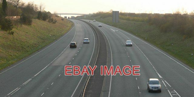PHOTO THE A46 CURVES AWAY TO THE SOUTH-WEST PHOTOGRAPHED FROM CLOSE TO ...