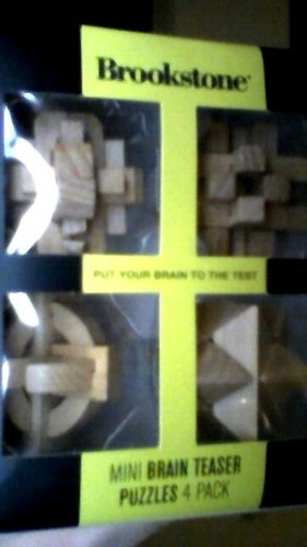 BROOKSTONE MINI BRAIN TEASERS / 4 PUZZLES / PUT YOUR BRAIN TO TEST | eBay
