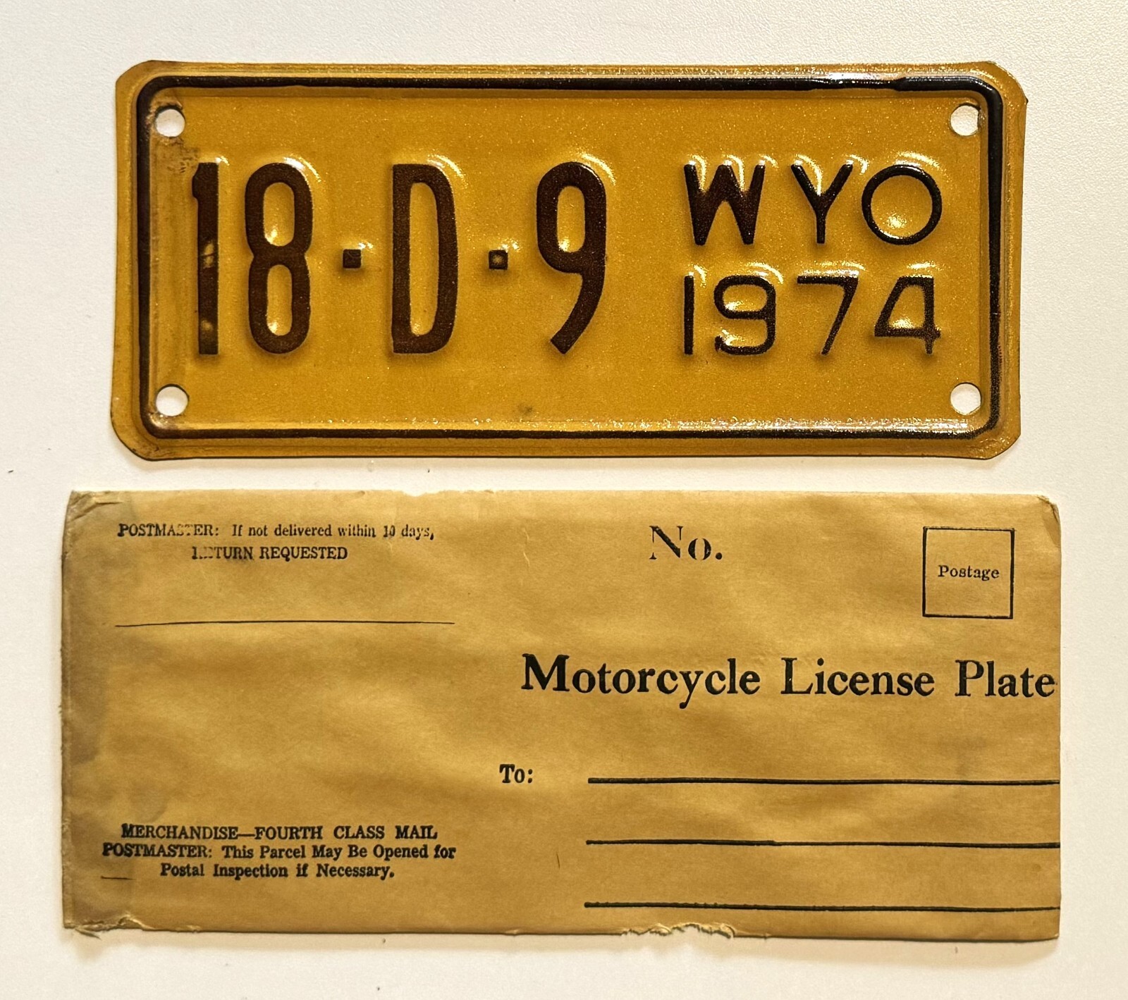 1974 Wyoming Motorcycle Dealer License Plate - With Original Mailing ...