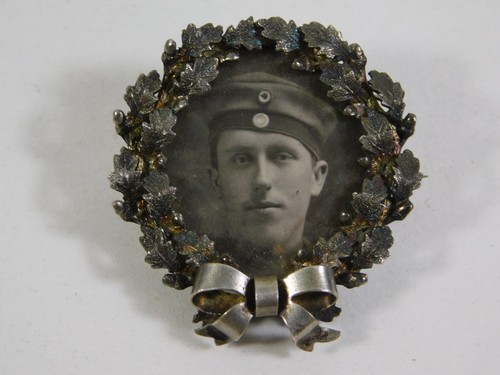 An original WW1 German soldier's silver-framed portrait brooch (a ...