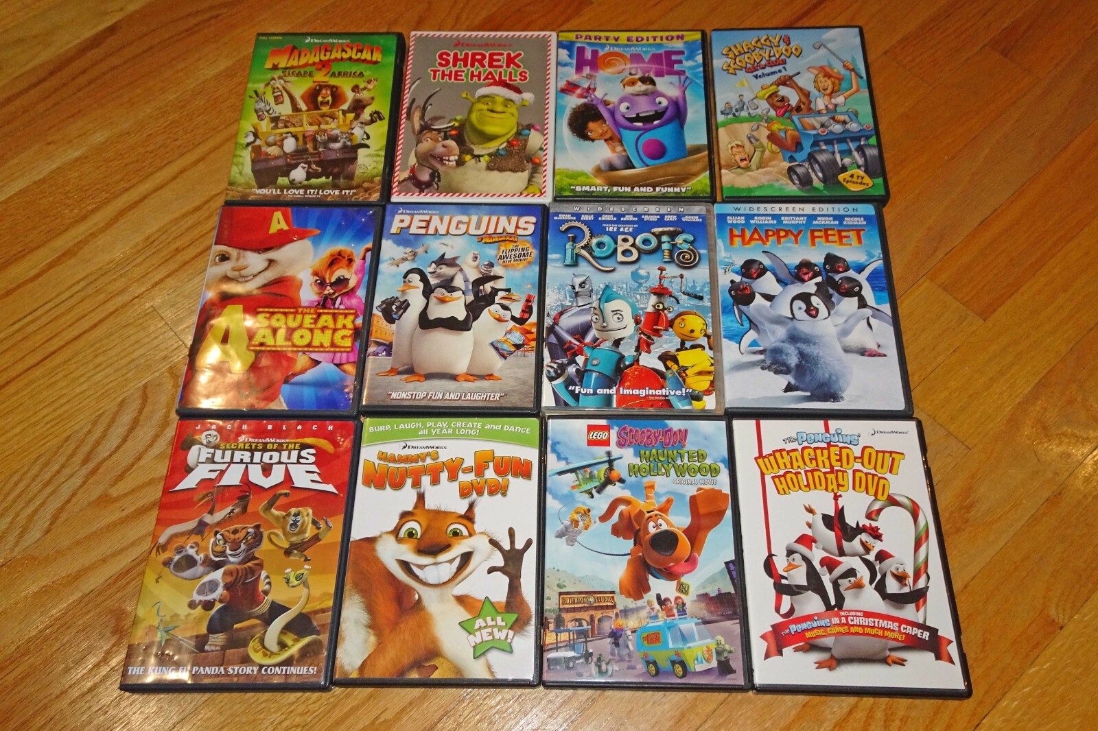 12 Children's DVDs (Madagascar, Shrek, Penguins, Shaggy, Scooby-Doo ...