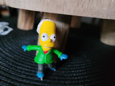 The Simpsons Lisa And Bart Simpson Ice Skating Ornaments | eBay