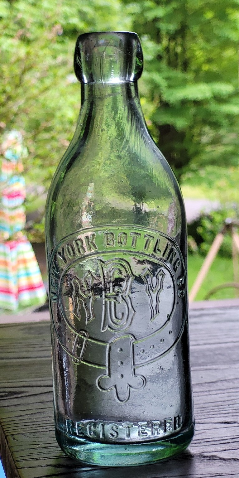 NICE NEW YORK BOTTLING CO EMBOSSED INSIDE BELT SHAPED SLUG PLATE | eBay