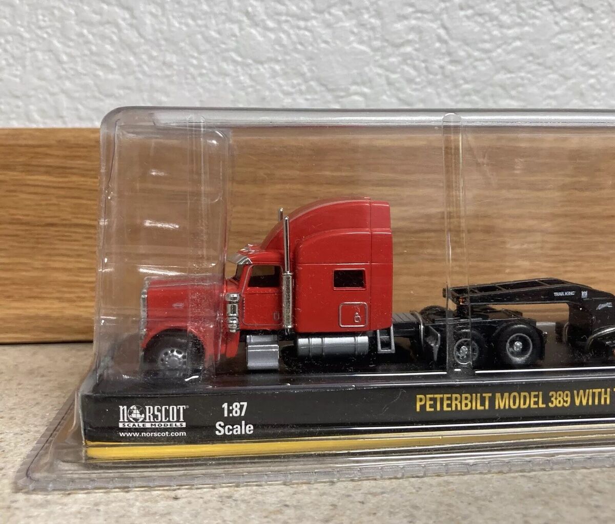 NIB Norscot Peterbilt Model 389 w/ Trail King Lowboy Trailer NIB Norscot Peterbilt Model 389 w/ Trail King Lowboy Trailer