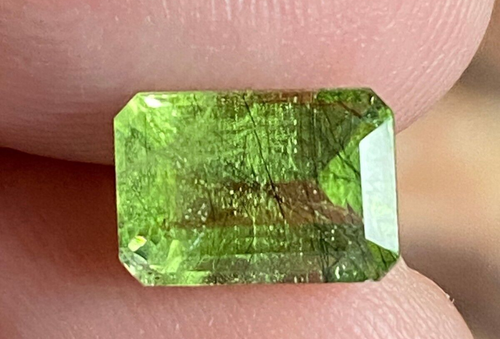 Faceted top quality peridot gem with ludwigite inclusions Skardu ...