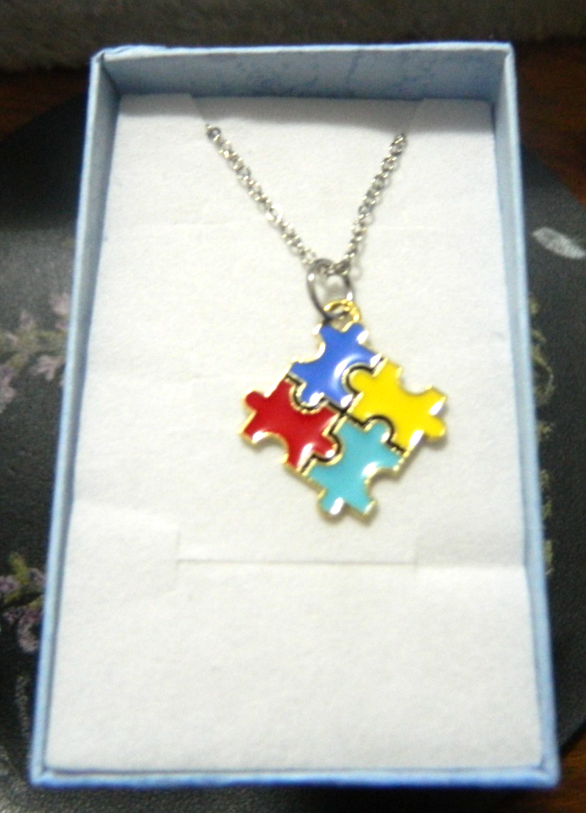 autism necklace multi colour enamelled puzzle piece ,making people ...
