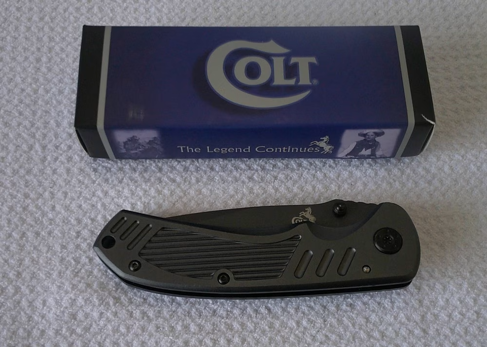NIB Beautiful Eye Catching Colt Titanium Finish Linerlock Knife! | eBay