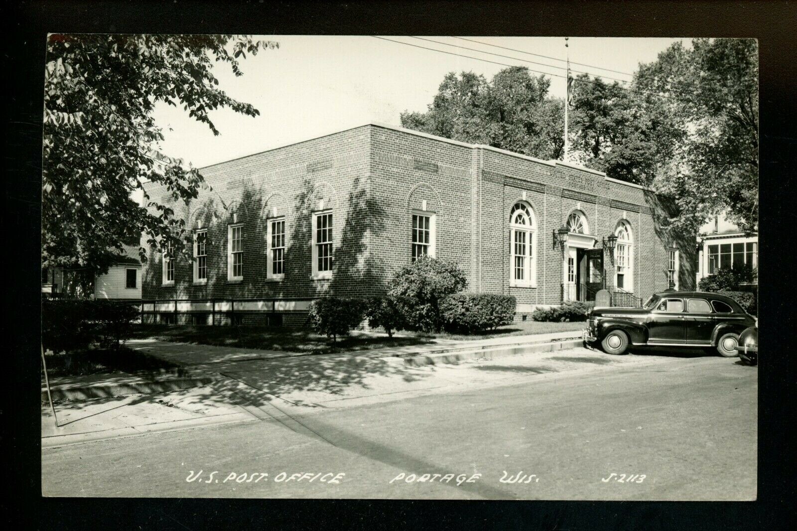 Post Office postcard Wisconsin WI Portage flag lanterns car gardens ...