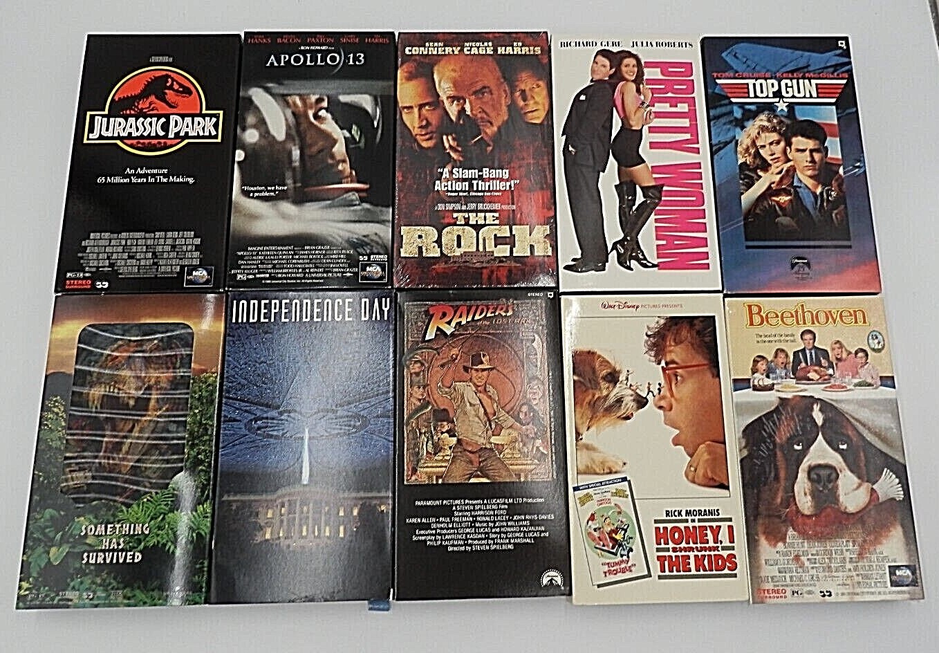 Lot of 10 1980s 1990s VHS Tapes Mega Hits; Raiders, Top Gun, Jurassic ...