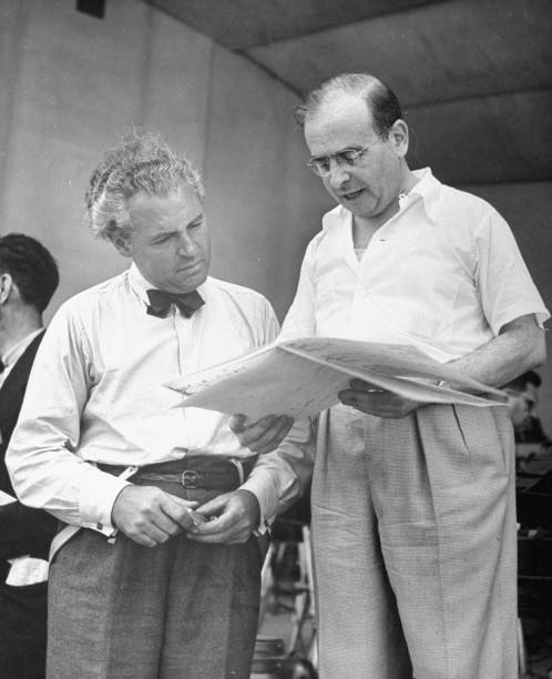 Conductor Max Steiner discussing the score for singer Frank Si- 1940s ...