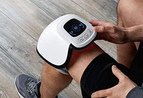 Bionic Compression Knee Massager w/ Infrared Heat from Sharper Image | eBay
