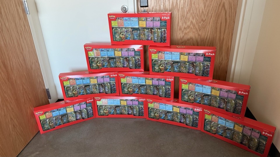 Prismatic Evolution Mini Tins 8 Pack Costco Pack | eBay