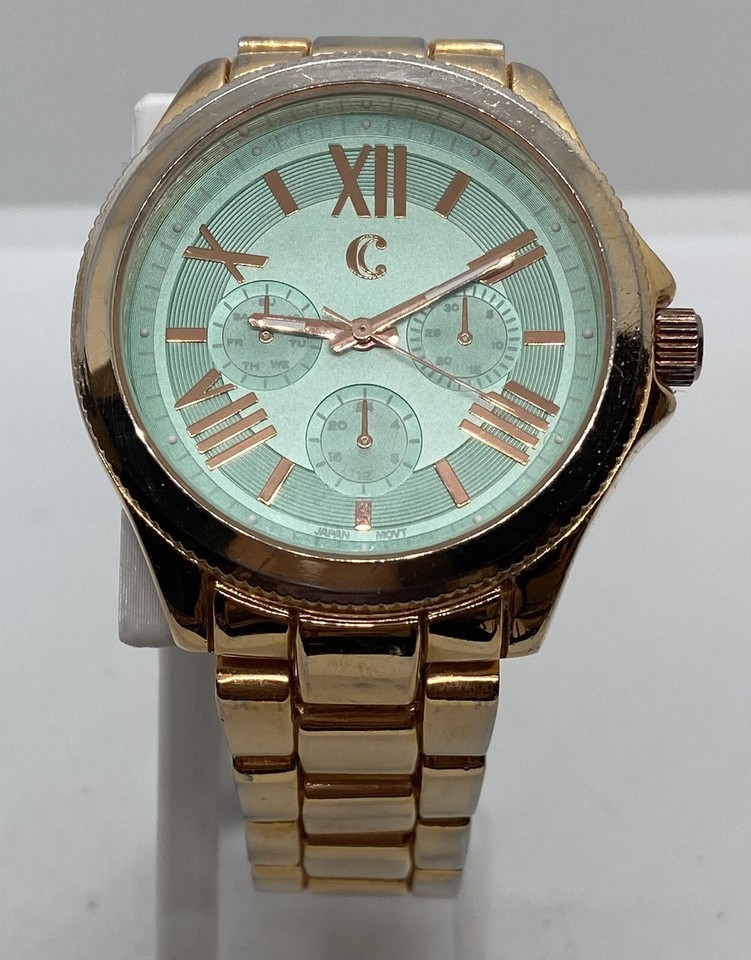 CC CHARMING CHARLIE Ladies Watch New Battery Large Aqua Dial Gold 7 ...