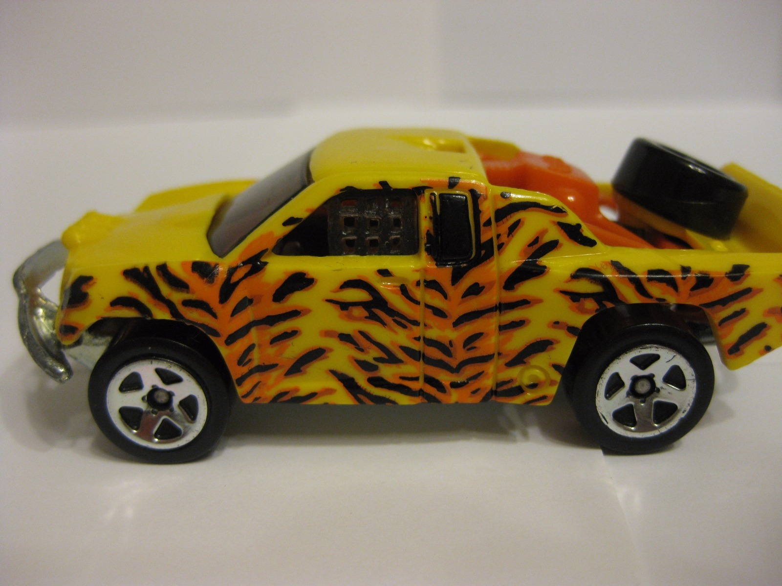 2004 Hot Wheels "Off Track" Yellow, Animal Print Pattern, Plastic Car ...