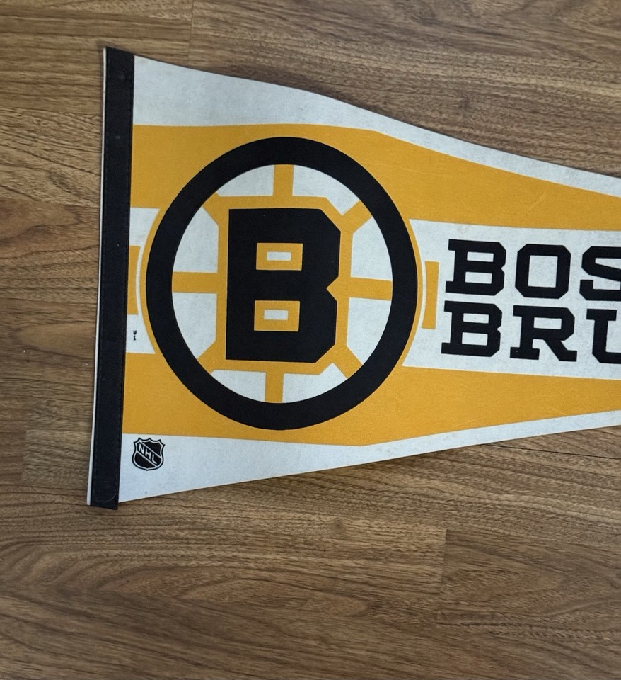 vintage Boston Bruins felt pennant featuring the iconic Spoked-B logo ...