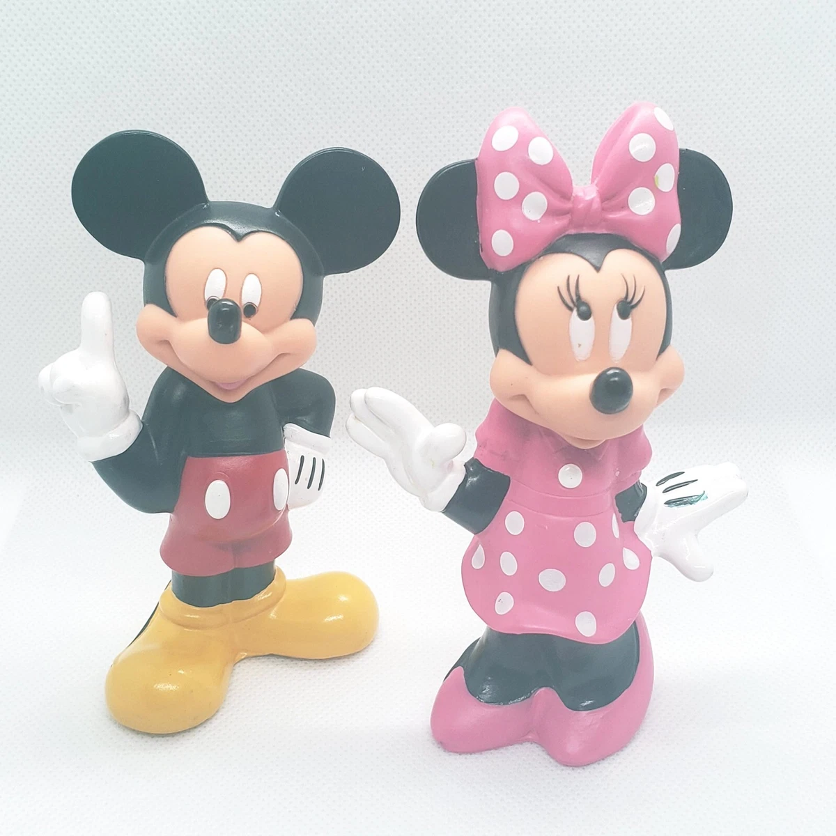 Mickey And Minnie Mouse Holding Hands