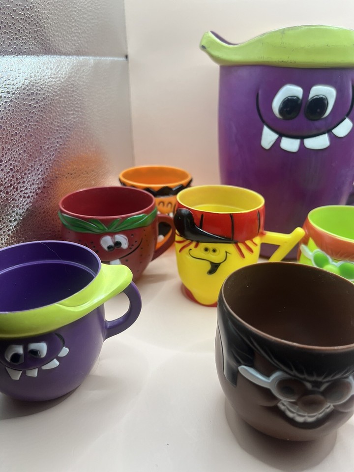 Pillsbury FUNNY FACE Set NINE MUGS & GOOFY GRAPE Pitcher W/ CHUG A LUG ...