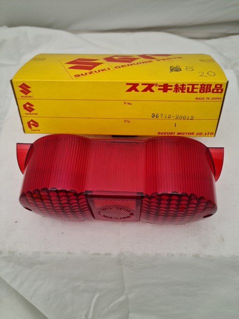 1972 T500 suzuki tail light lens 35712-29012 slight marring on finish ...