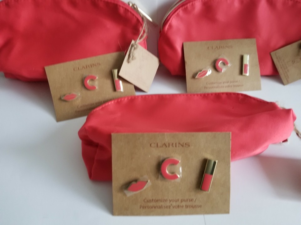 CLARINS PINK COSMETIC TRAVEL BAG WITH CLARINS LOGO PINS . BUY 1,2 OR 3 ...